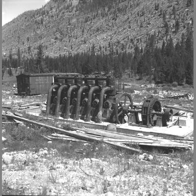 Large Abandoned Diesel Engine in Mountain Meadow, August 1959