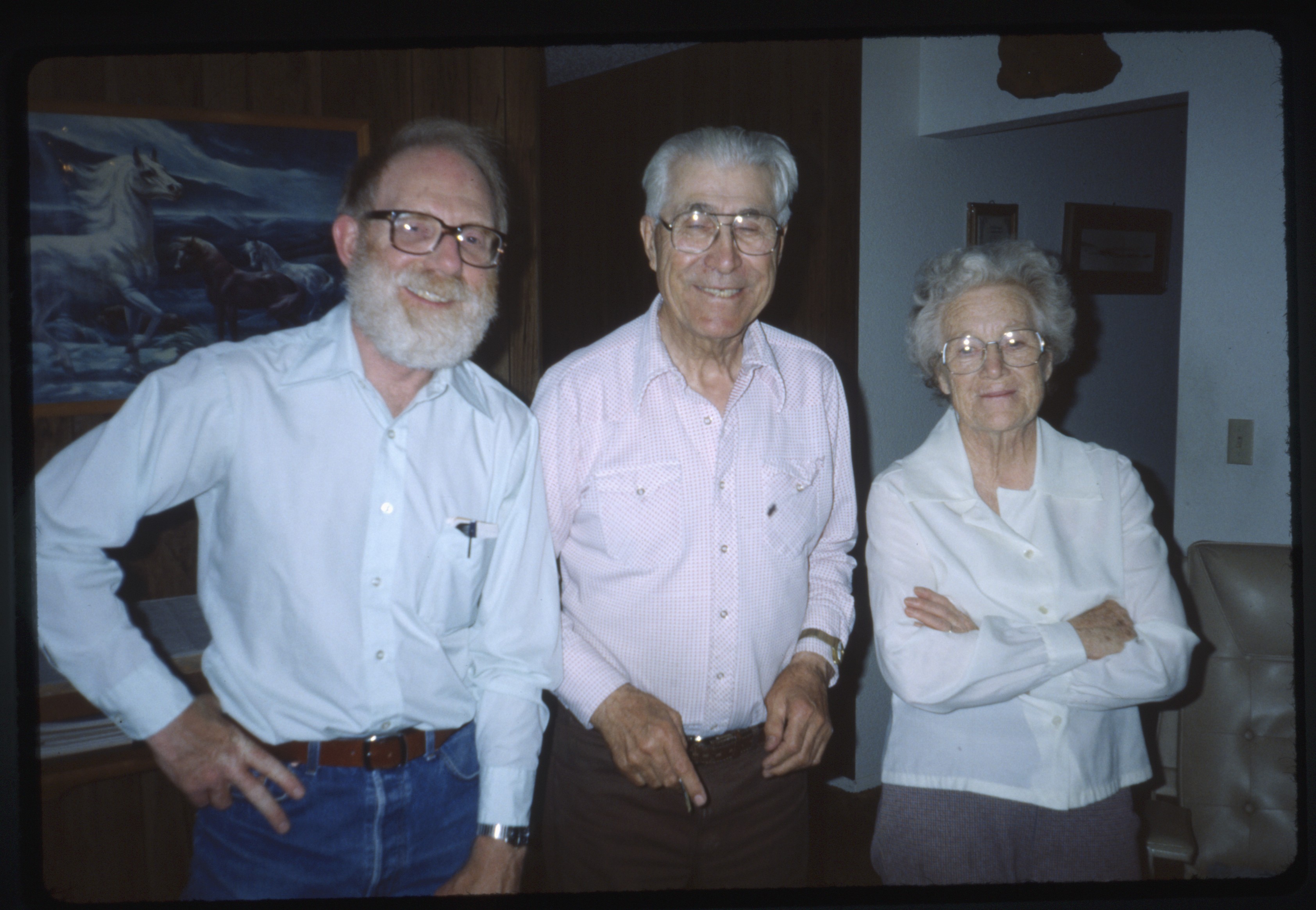 Ivan Doig, Marcus Matovich, and Ruby Matovich stand for a group portrait