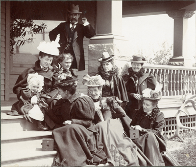 Frances Hamilton Sitting on Steps with Others, c. 1895